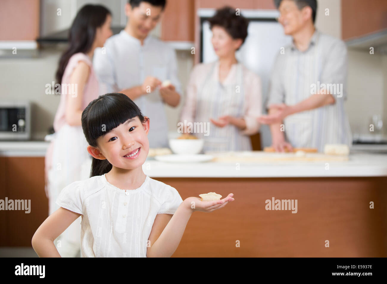 Happy family making dumplings Stock Photo - Alamy Happy family making dumplings Stock Photo - Alamy