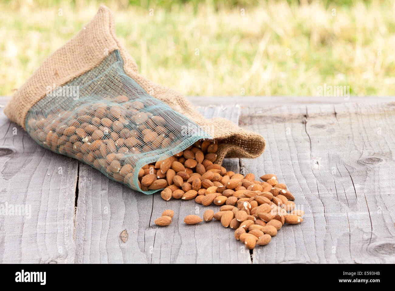 Almonds on table Stock Photo - Alamy