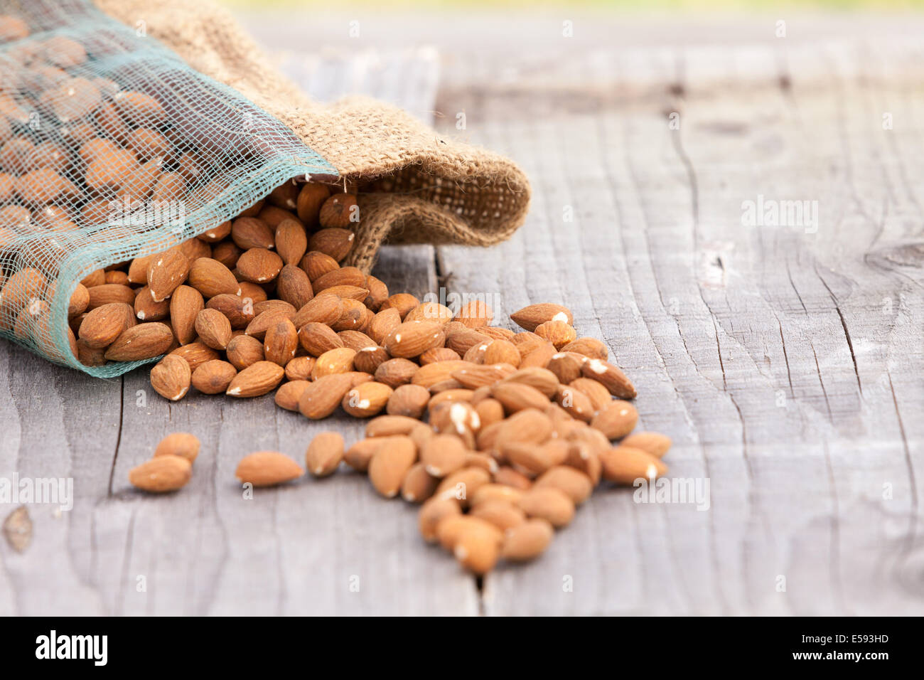 Almonds on table Stock Photo - Alamy