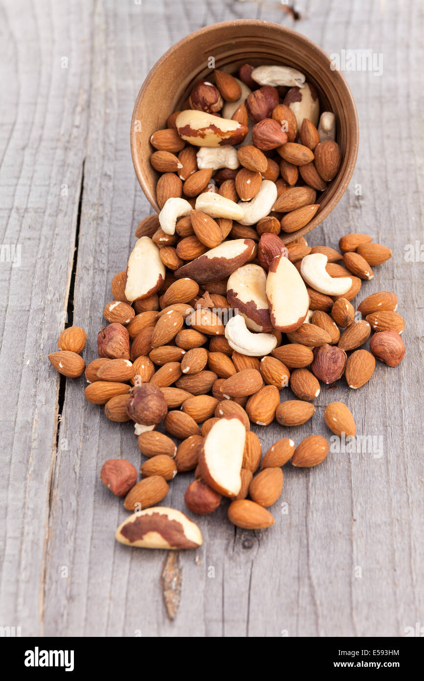 Cashew, almond, hazel and brazilian nuts on dropped bowl Stock Photo ...