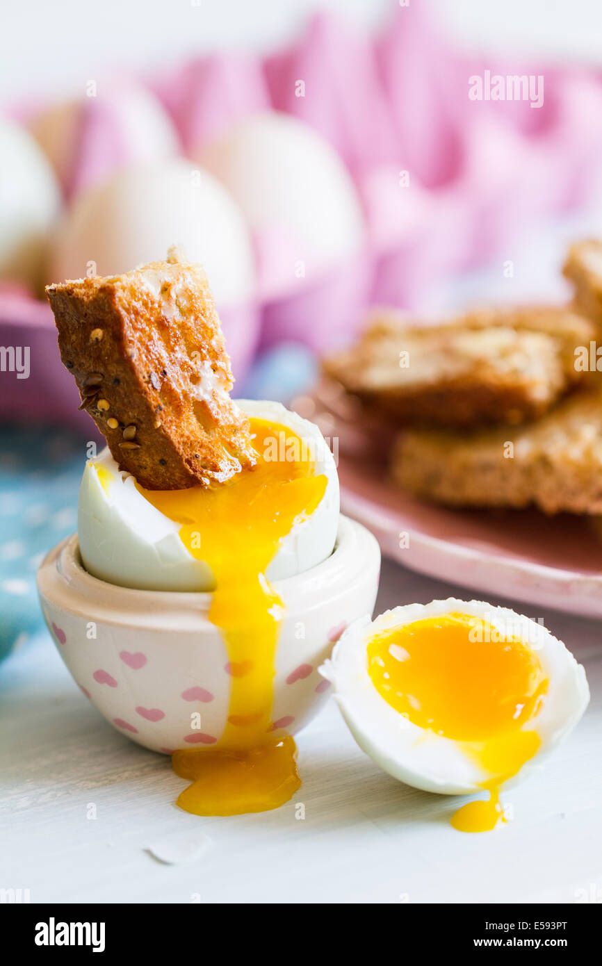 Series on boiled duck egg for breakfast, with toast soldiers Stock ...