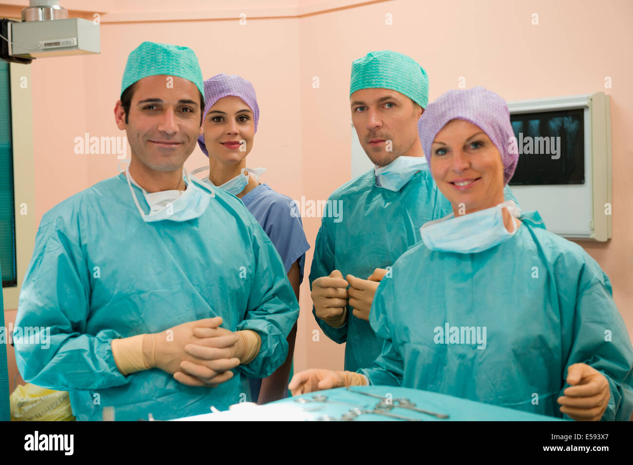 Medical team smiling in an operating room Stock Photo - Alamy
