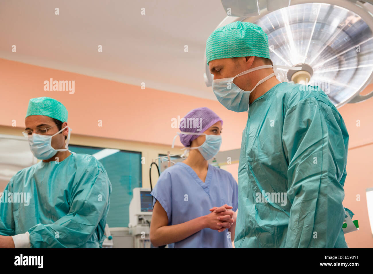 Medical team preparing for an operation in an operating room Stock ...