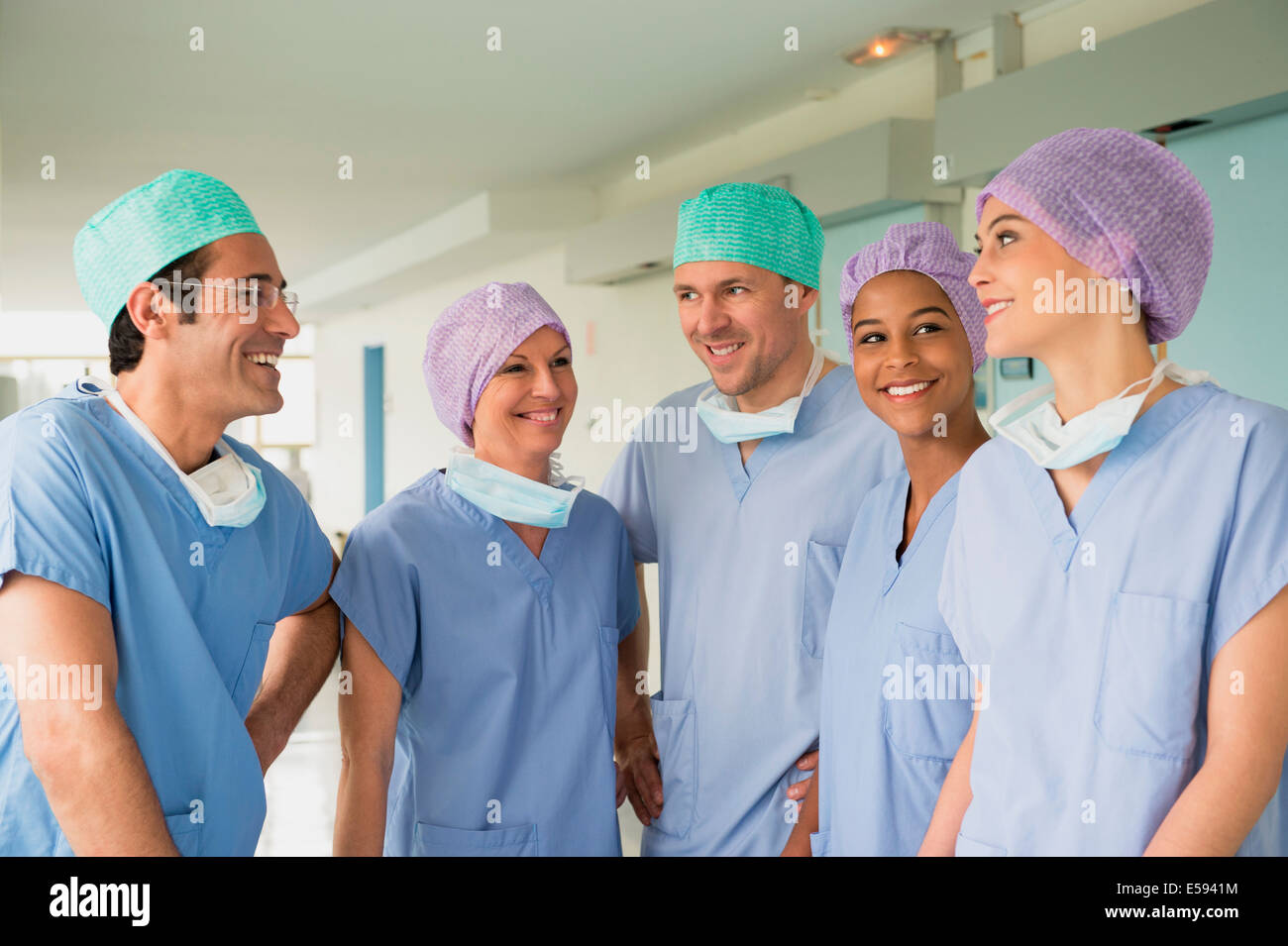 Medical team smiling Stock Photo - Alamy