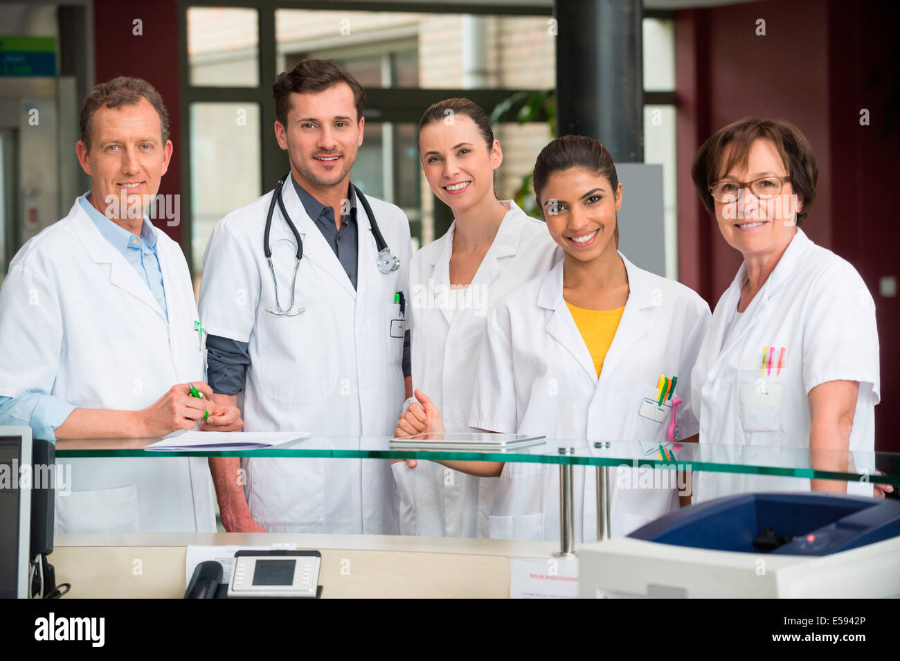 Portrait of medical-team smiling Stock Photo - Alamy