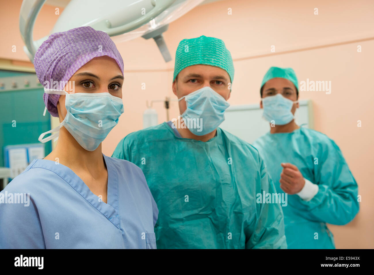 Portrait three medical professionals looking hi-res stock photography ...