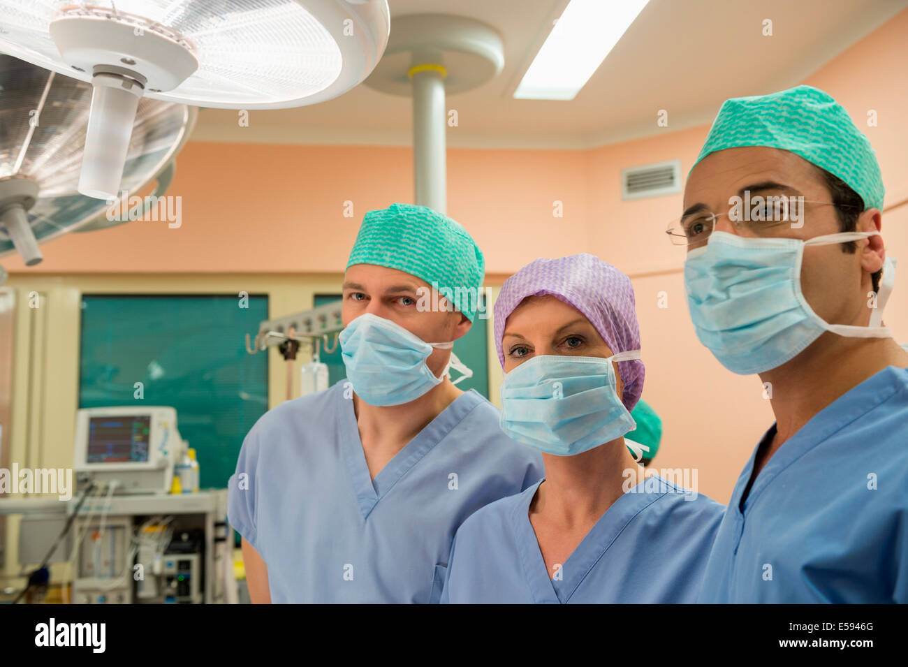 Surgeons in an operating room Stock Photo - Alamy