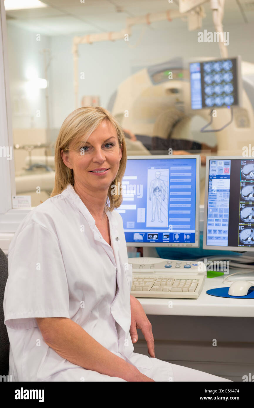 Female doctor smiling in medical MRI scan monitor room Stock Photo - Alamy