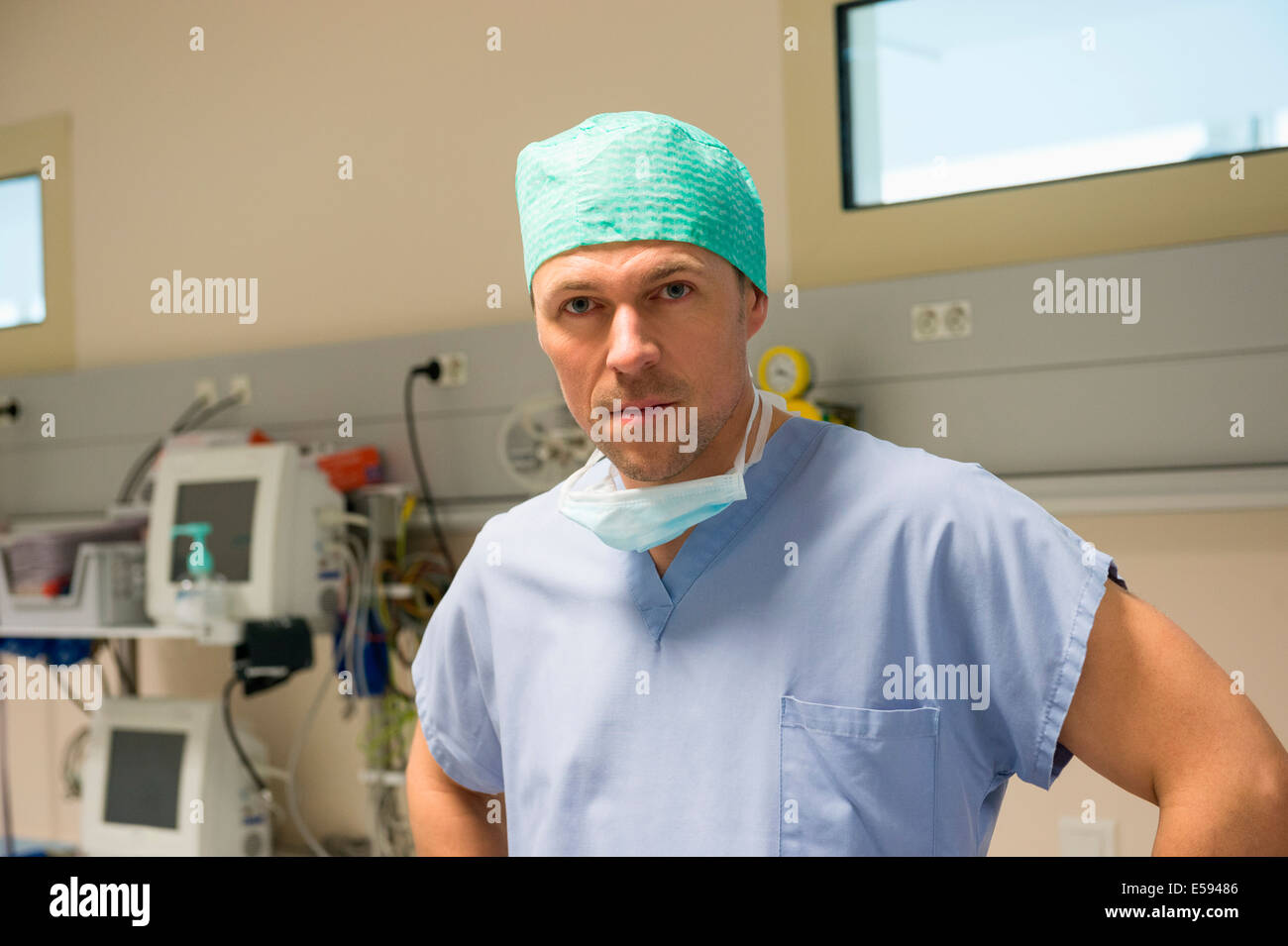 Portrait of a male surgeon in operating room Stock Photo - Alamy