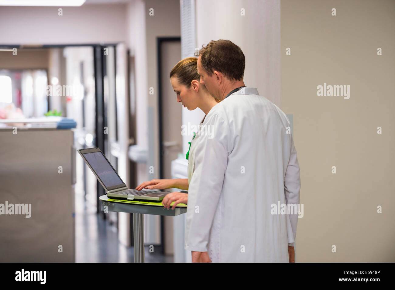 Doctor analyzing hi-res stock photography and images - Alamy