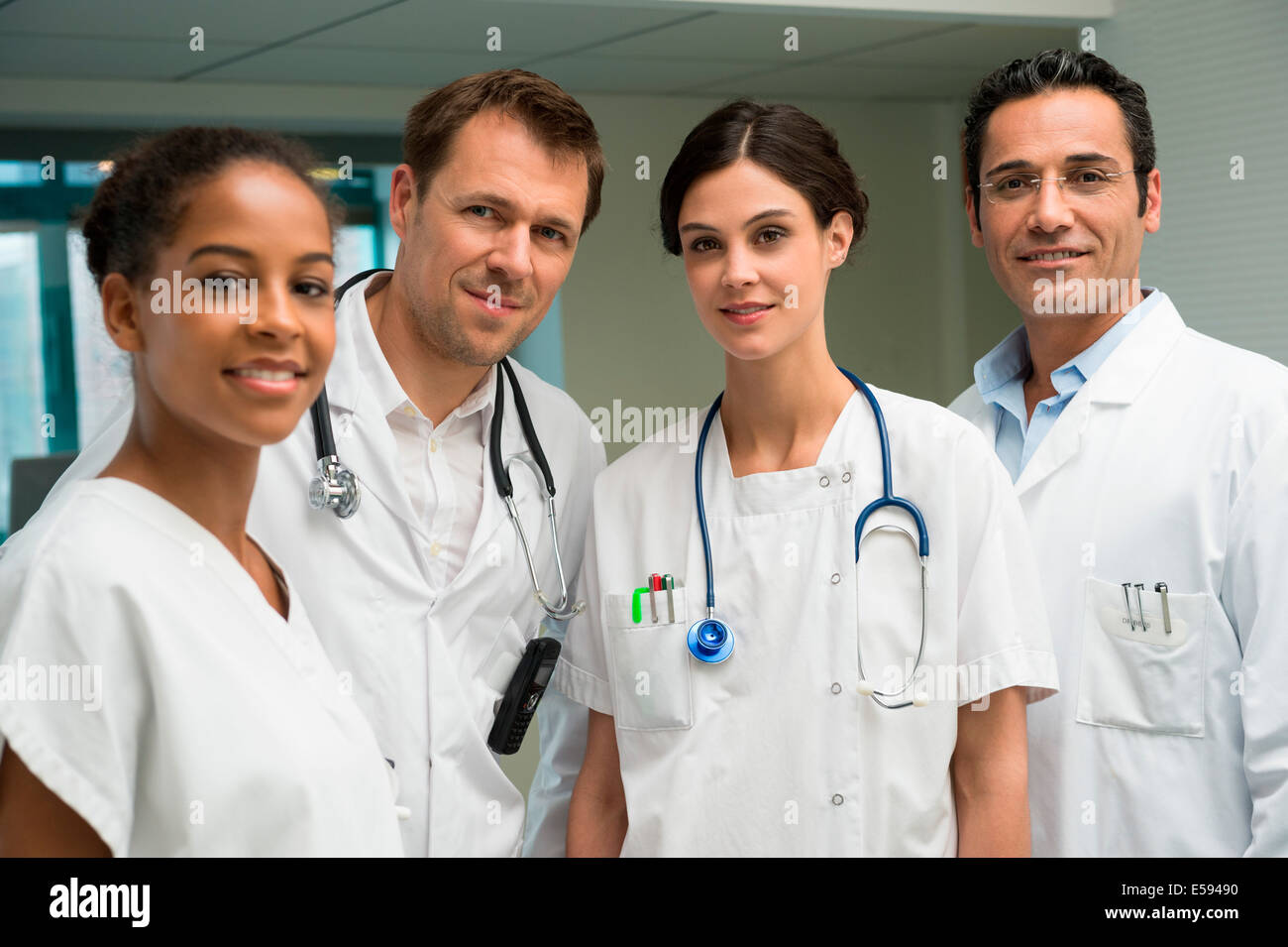 Portrait of a medical team smiling Stock Photo - Alamy