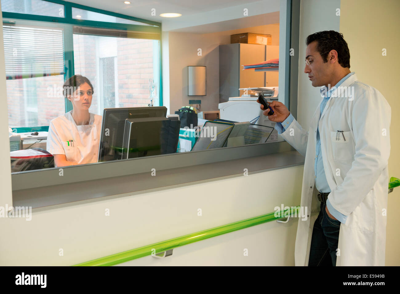 Busy nurses office Stock Photo - Alamy