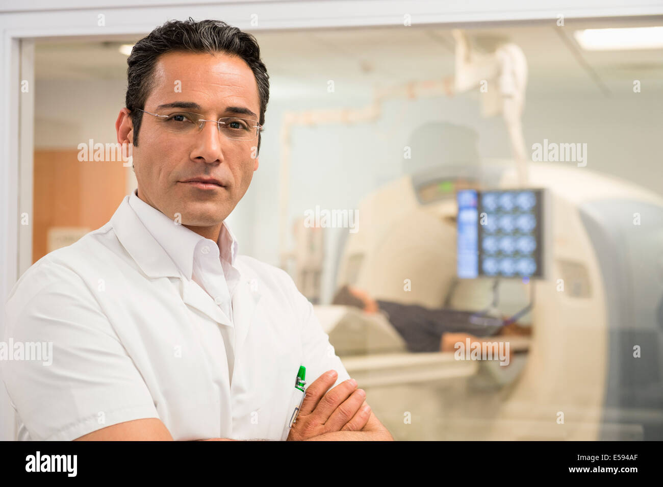 Portrait of a male doctor in medical MRI scan room Stock Photo - Alamy