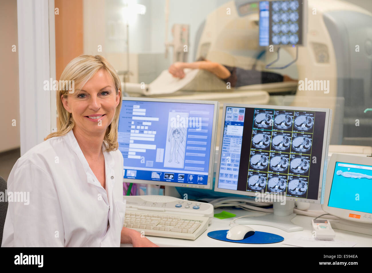 Female doctor smiling in medical MRI scan monitor room Stock Photo - Alamy