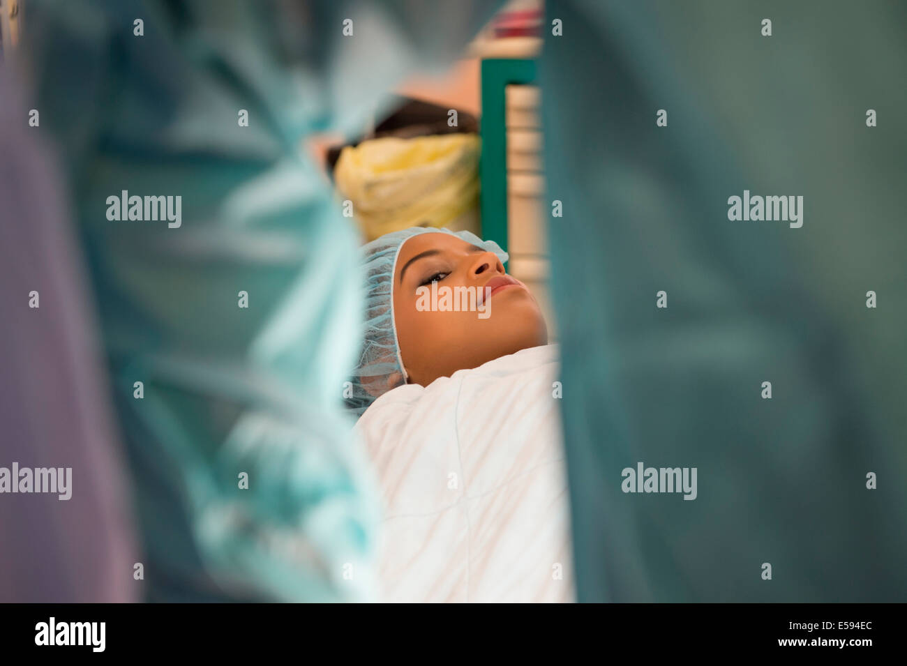 Female patient lying on a stretcher in an operating room Stock Photo ...