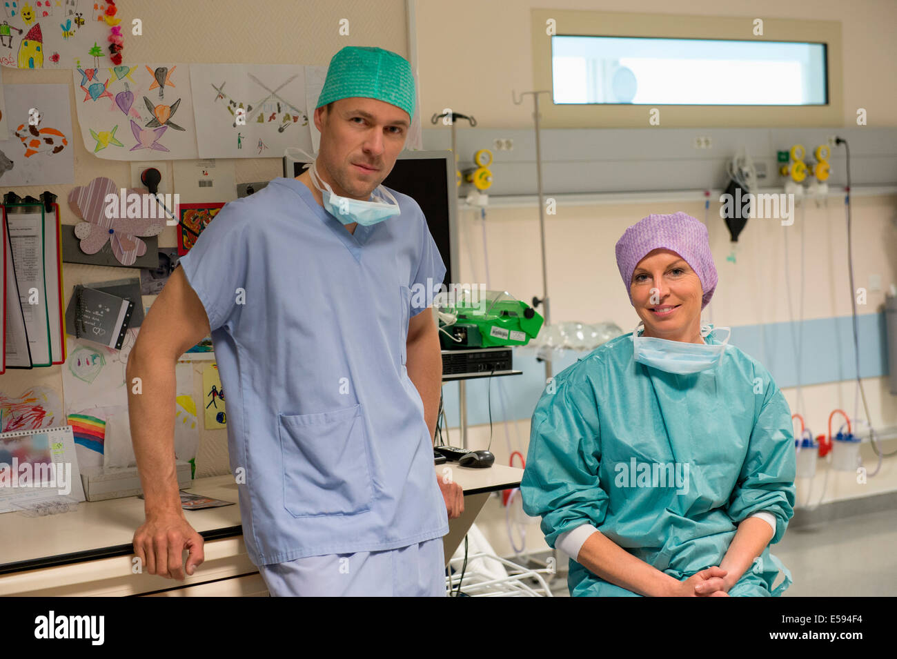 Portrait of a male and female surgeons in recovery room Stock Photo - Alamy