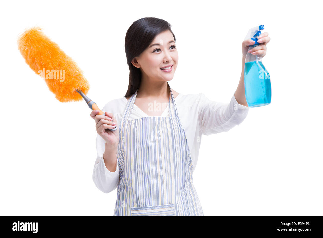 Happy woman doing housework Stock Photo - Alamy