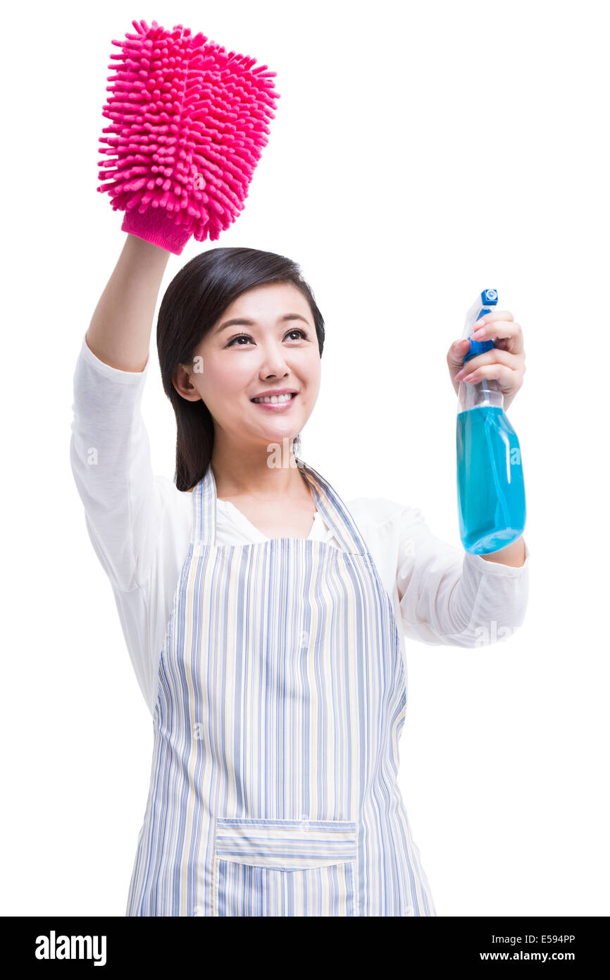 Happy woman doing housework Stock Photo - Alamy