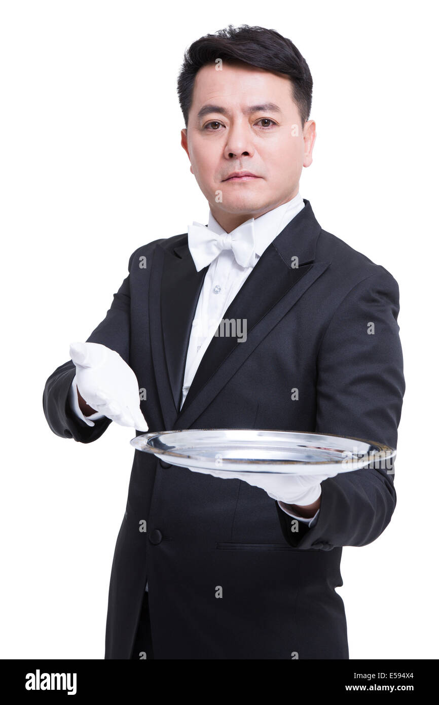 Happy waiter with serving tray Stock Photo - Alamy