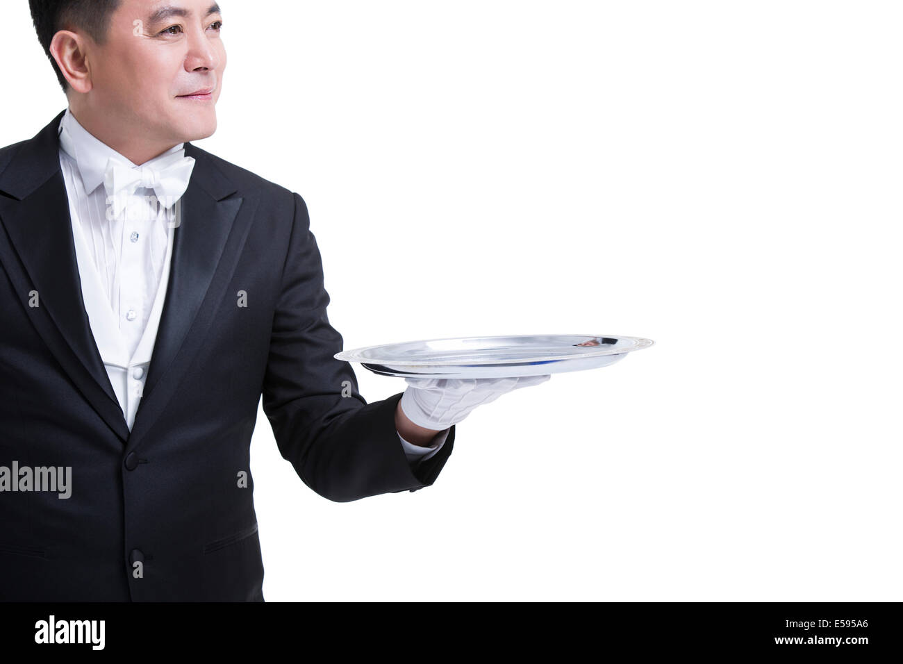 Happy waiter with serving tray Stock Photo - Alamy