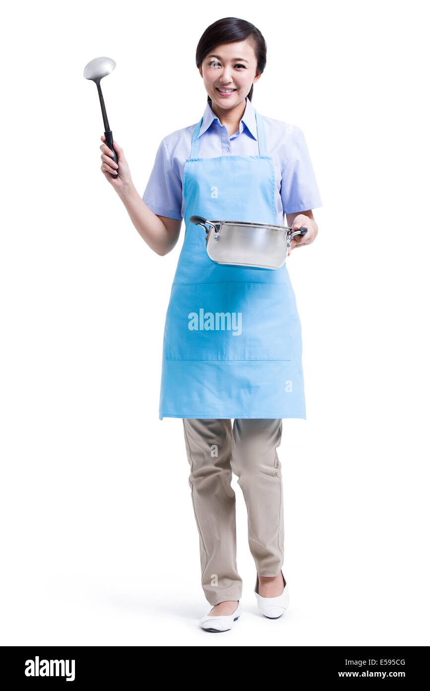 Domestic servant cooking Stock Photo - Alamy