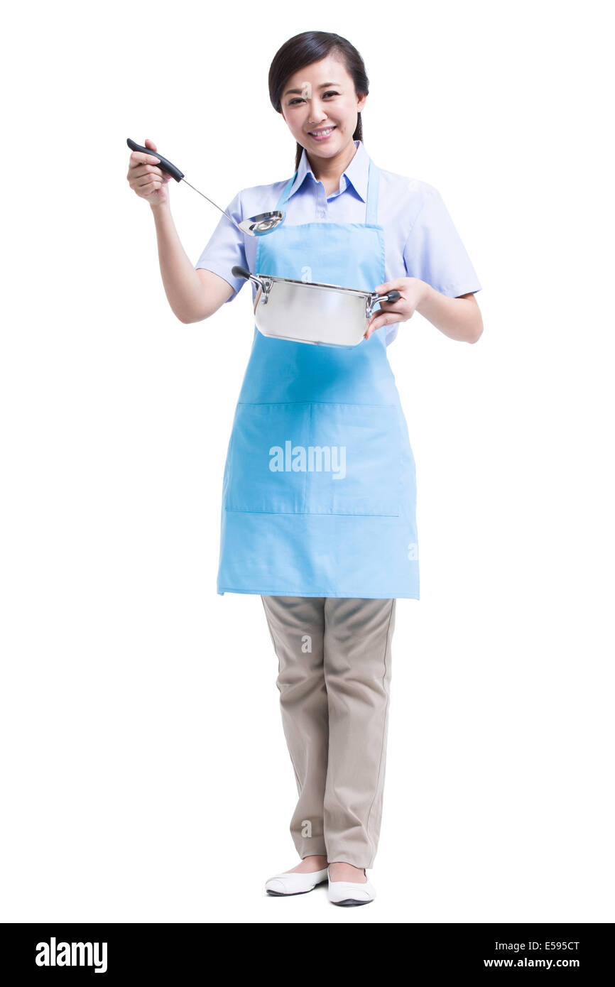 Domestic servant cooking Stock Photo - Alamy
