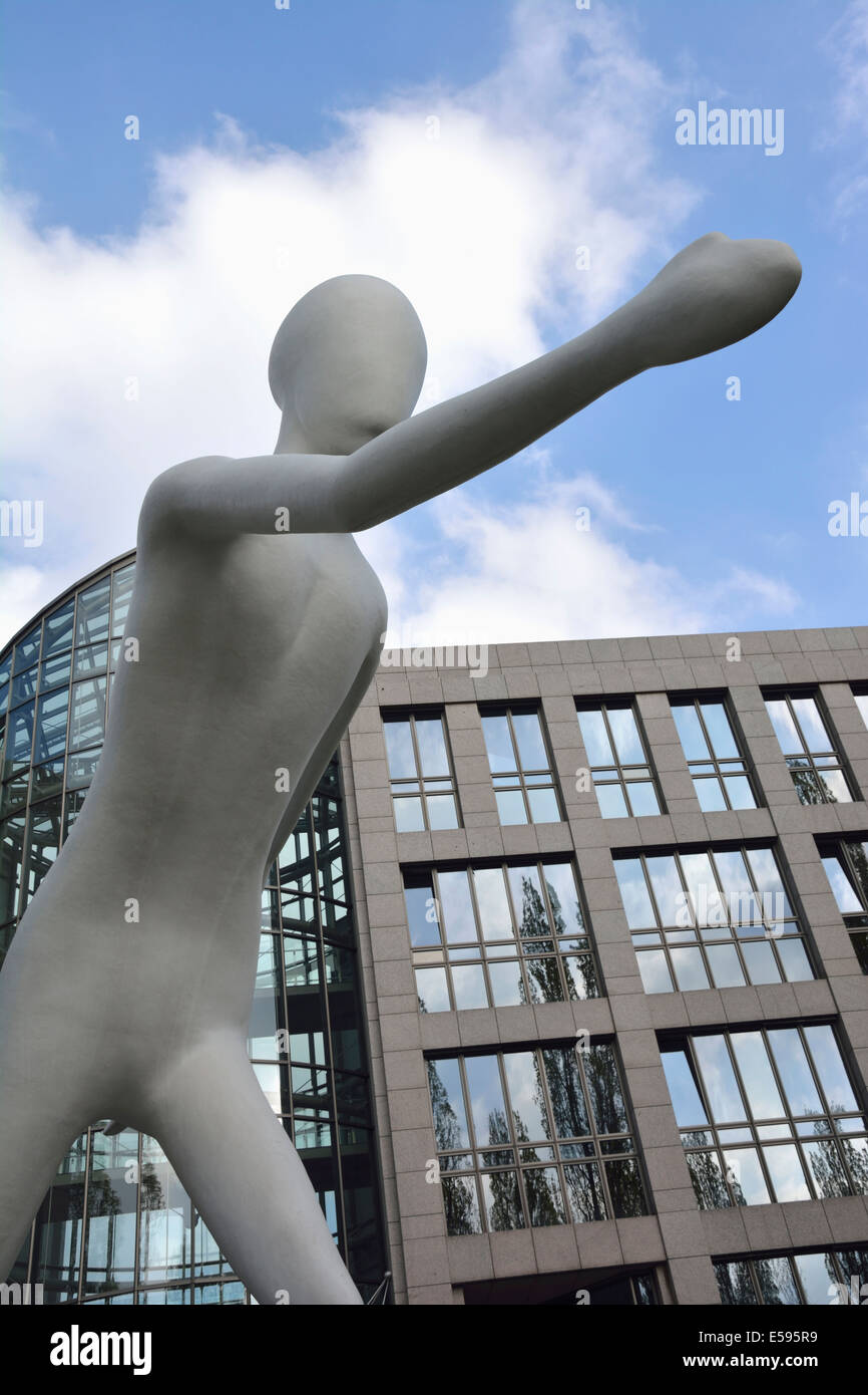Walking man sculpture munich germany High Resolution Stock Photography ...