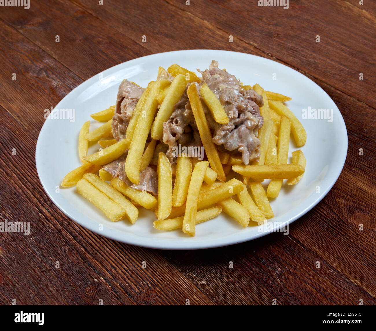 Slice pork and french fries. close up Stock Photo - Alamy