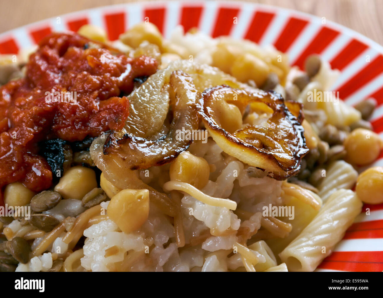 Kushari - is an Egyptian dish of rice, macaroni and lentils mixed ...