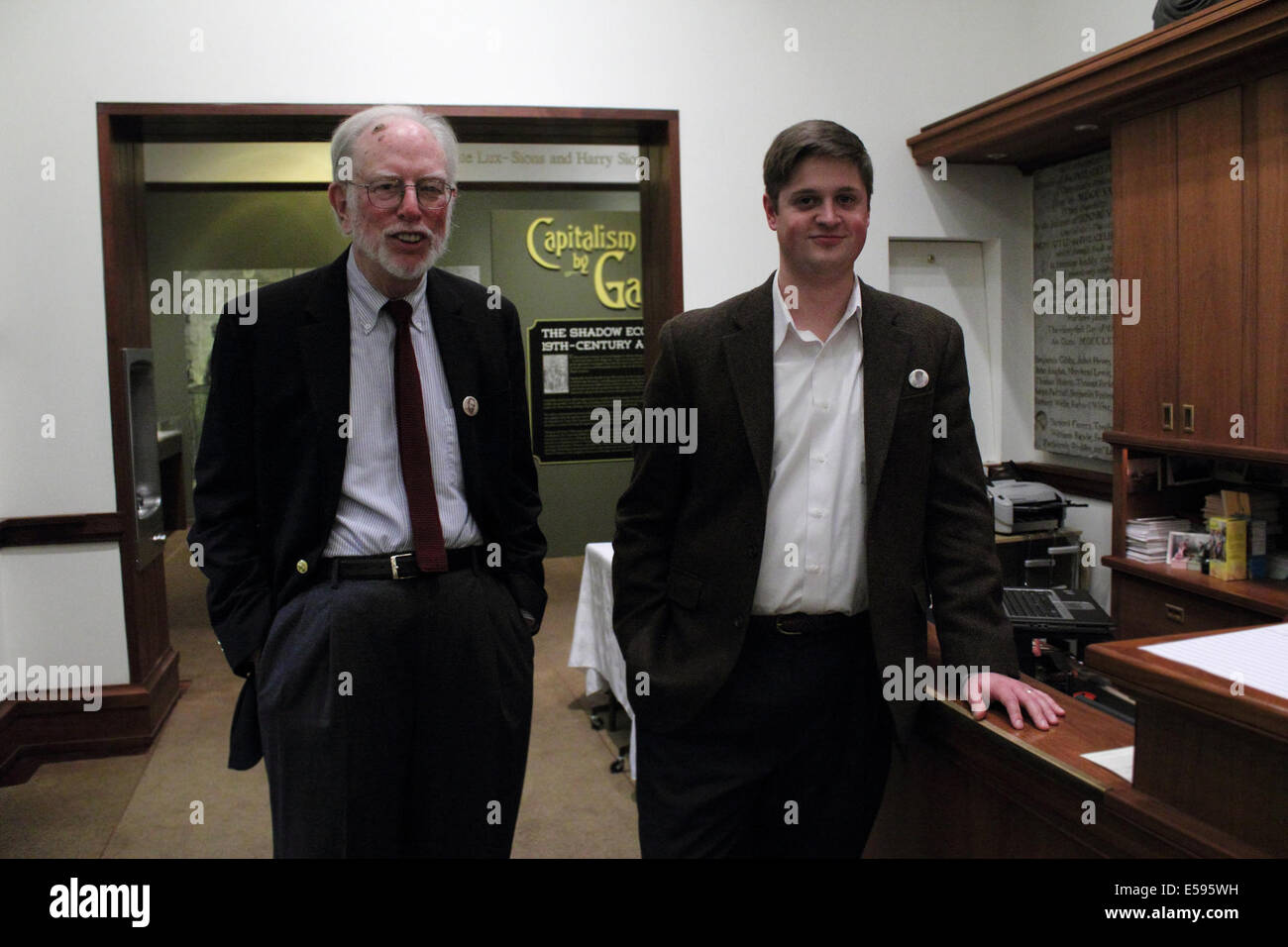 A photograph showing a gaslight reception, depicting the interior of a ...