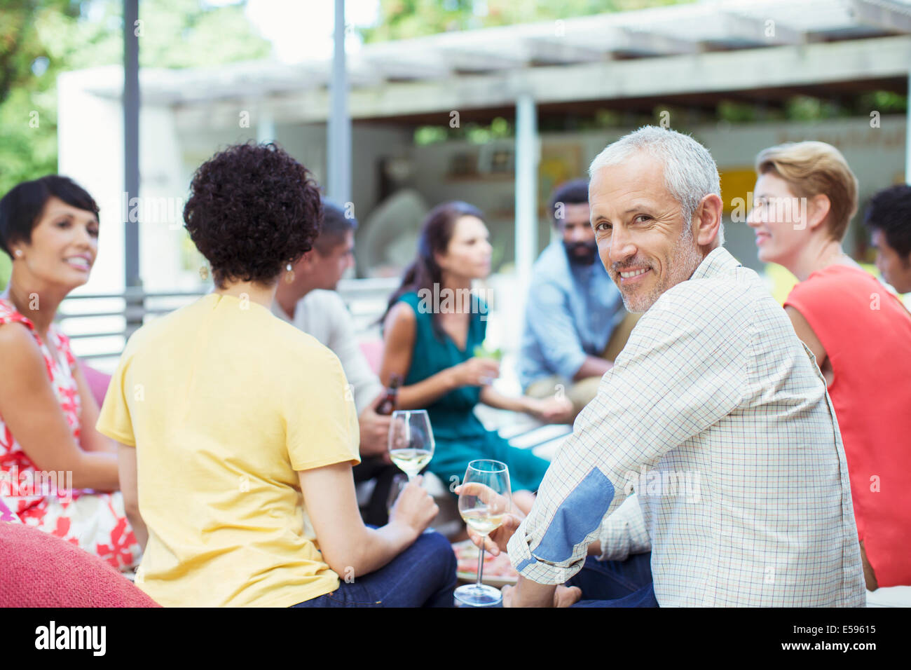 Man smiling at party Stock Photo - Alamy