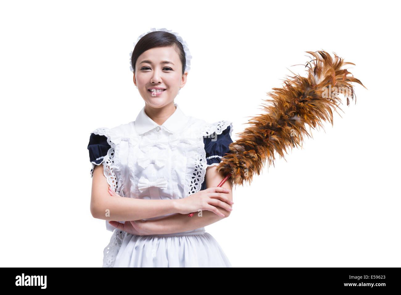 Holding duster Cut Out Stock Images & Pictures - Alamy