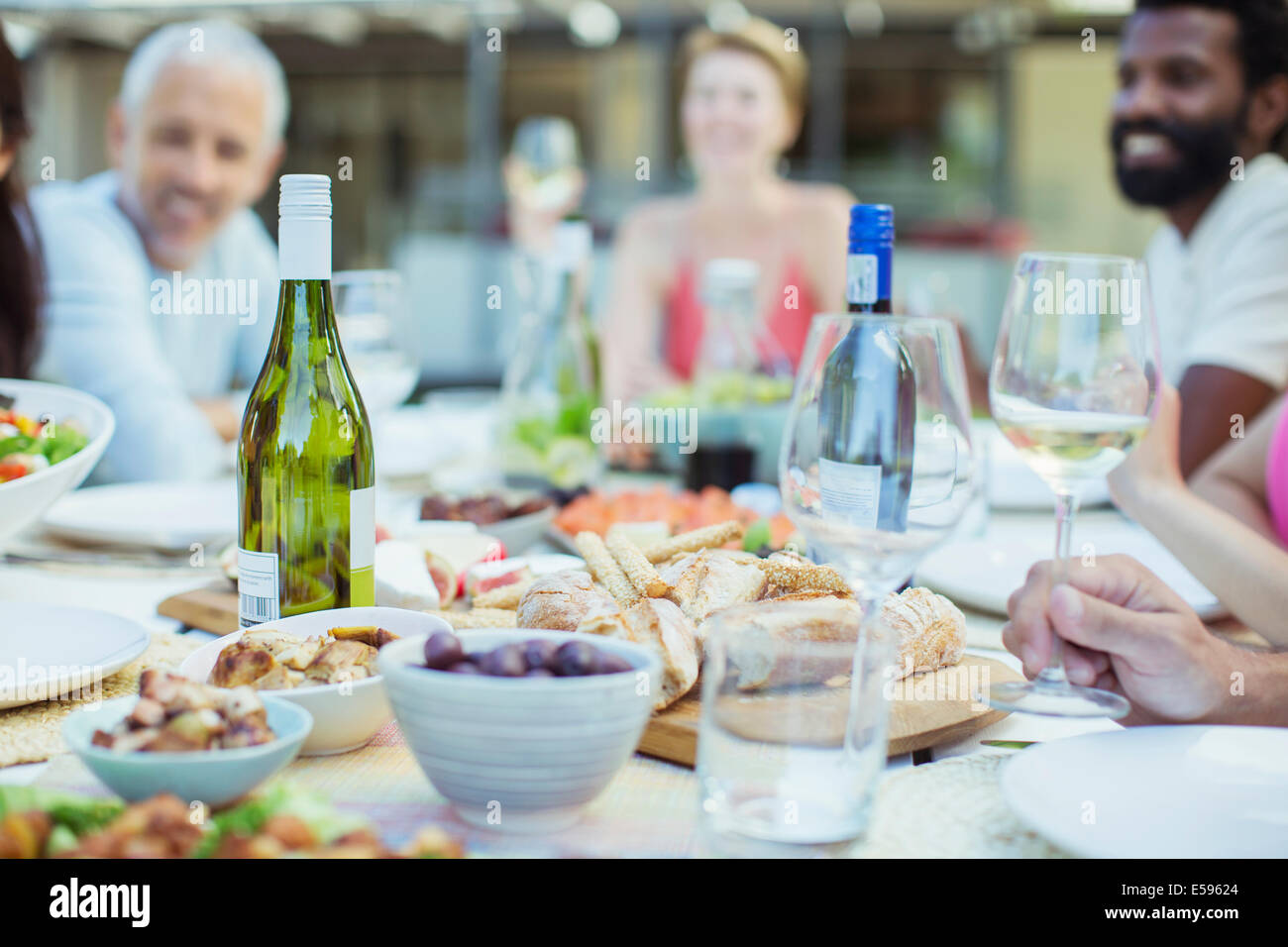 Plates of food on table outdoors Stock Photo - Alamy