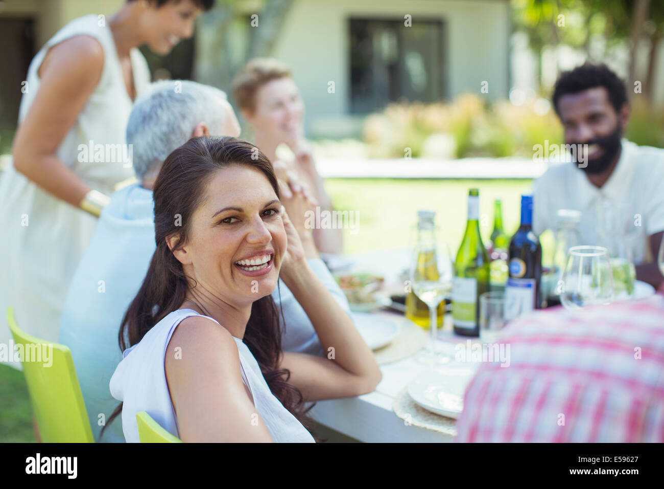 Mature woman sitting table hi-res stock photography and images - Alamy