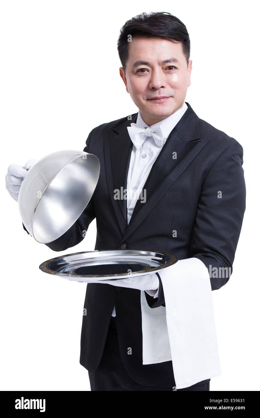 Happy waiter serving food Stock Photo - Alamy