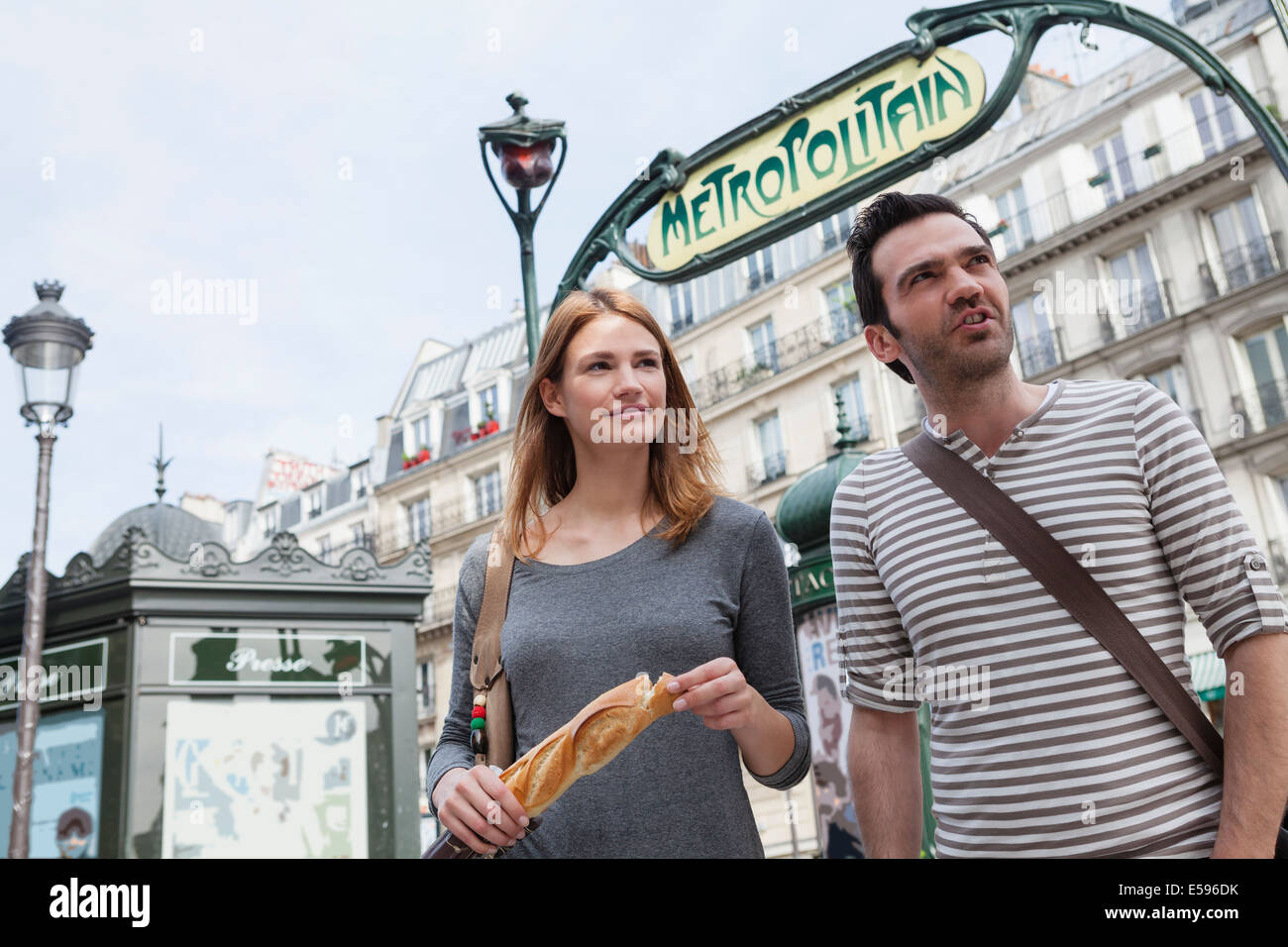 France, Paris, portrait of happy couple having fun Stock Photo - Alamy