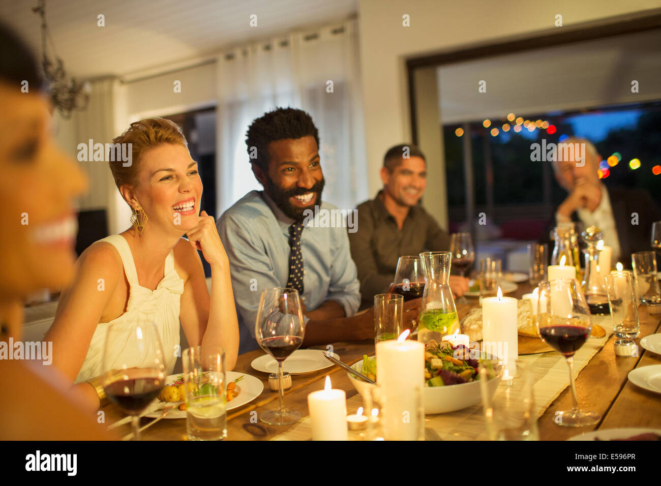 Mature friends laughing wine hi-res stock photography and images - Alamy