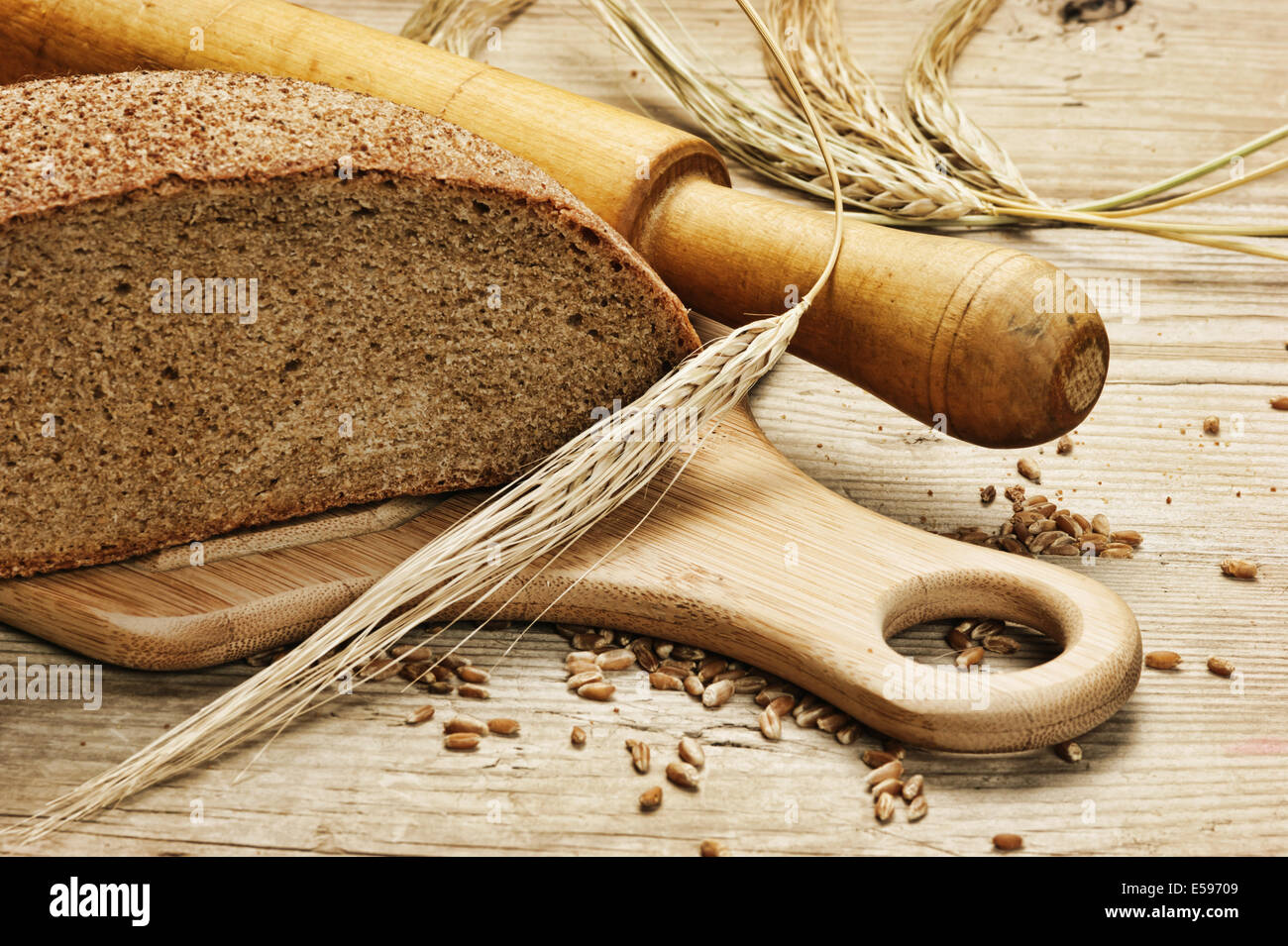 rye bread, and corn on the wooden table Stock Photo - Alamy