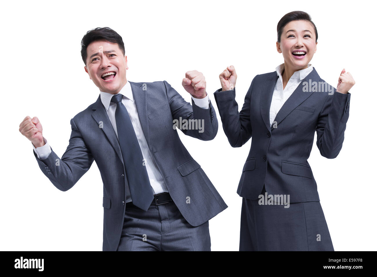 Excited business people celebrating Stock Photo - Alamy