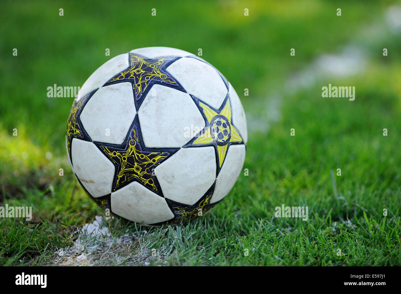 Soccer ball on soccer field Stock Photo - Alamy