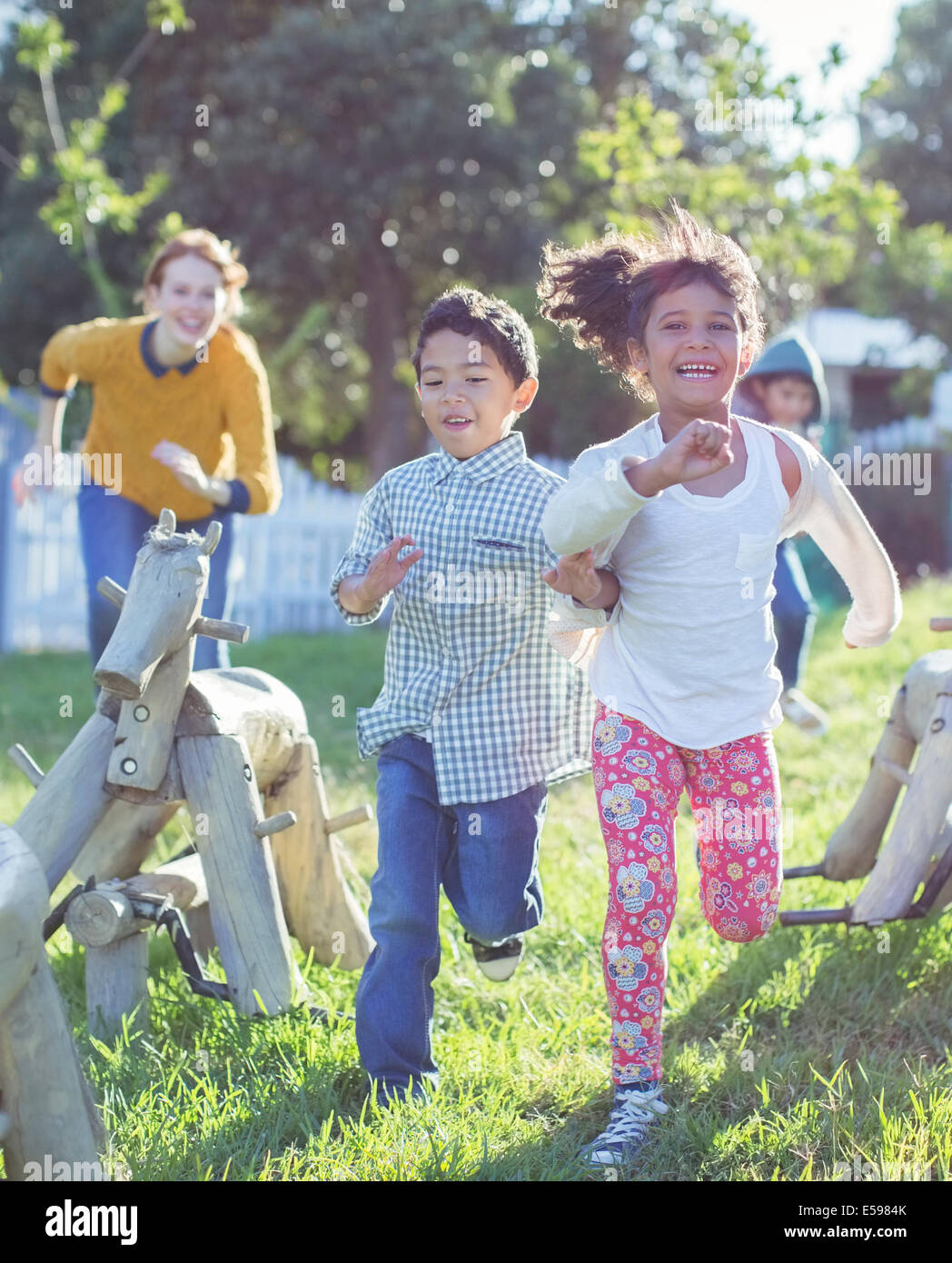 Children running on playground Stock Photo - Alamy