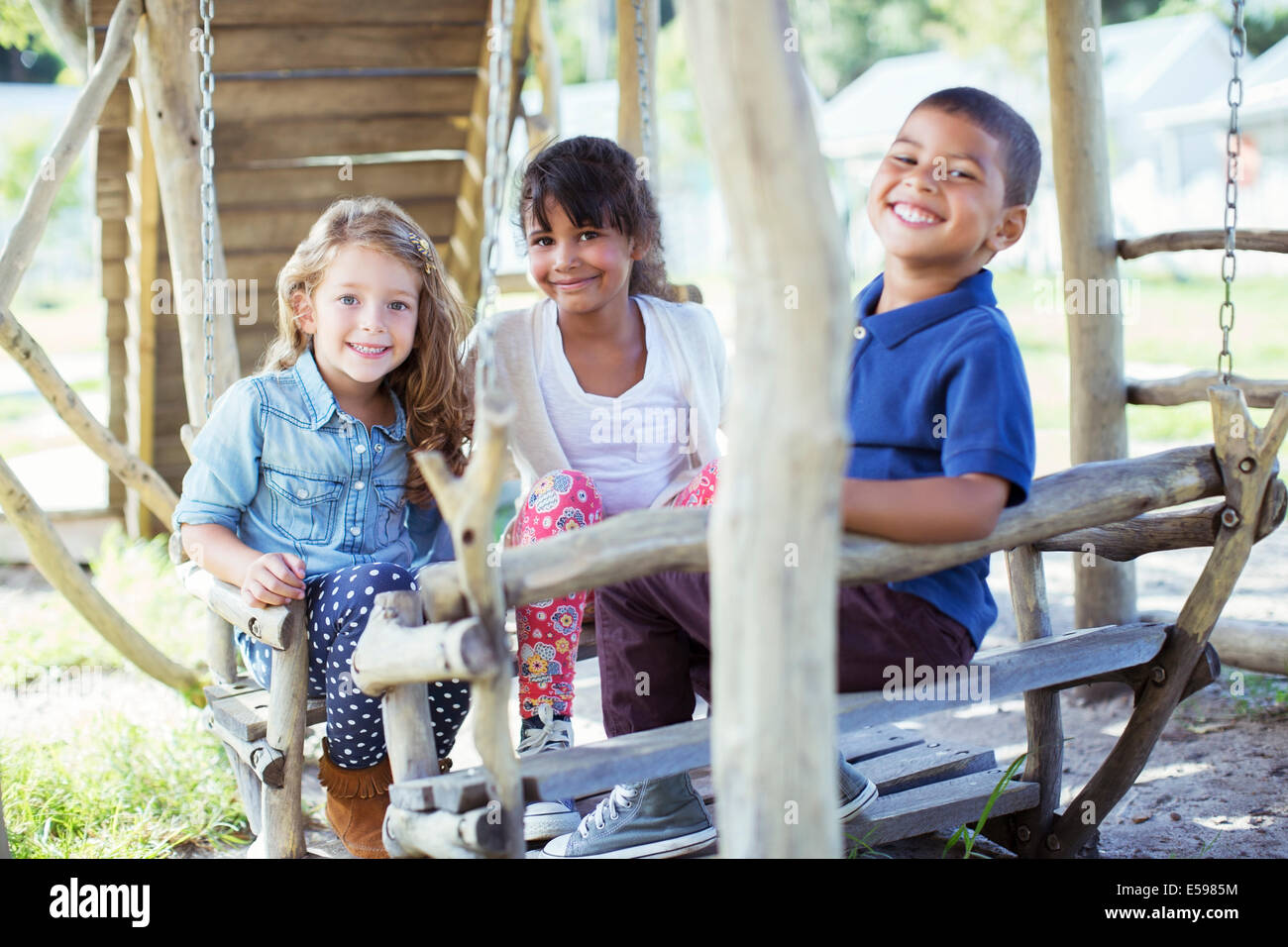 Children playing on play structure Stock Photo - Alamy