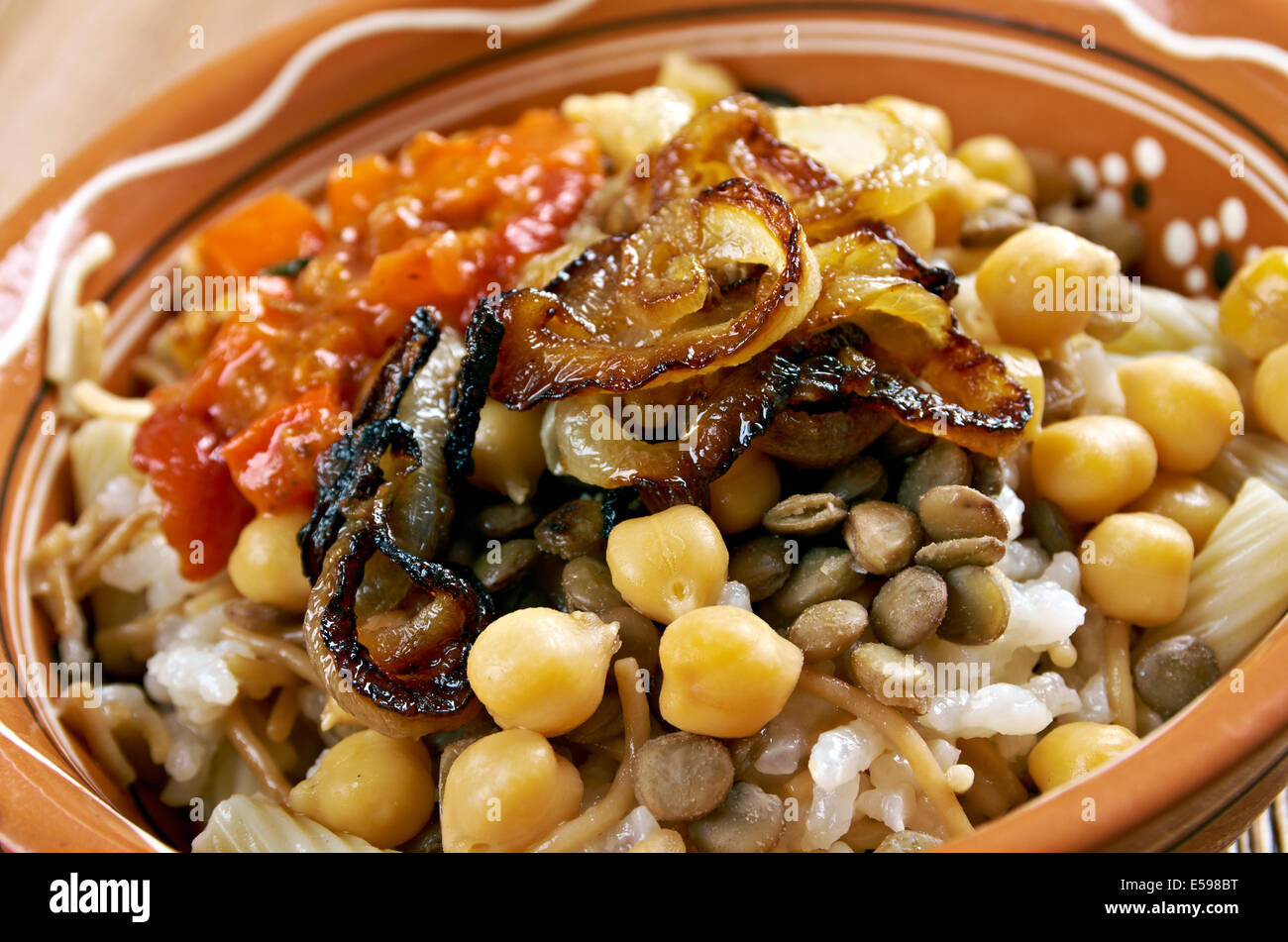 Kushari - is an Egyptian dish of rice, macaroni and lentils mixed ...