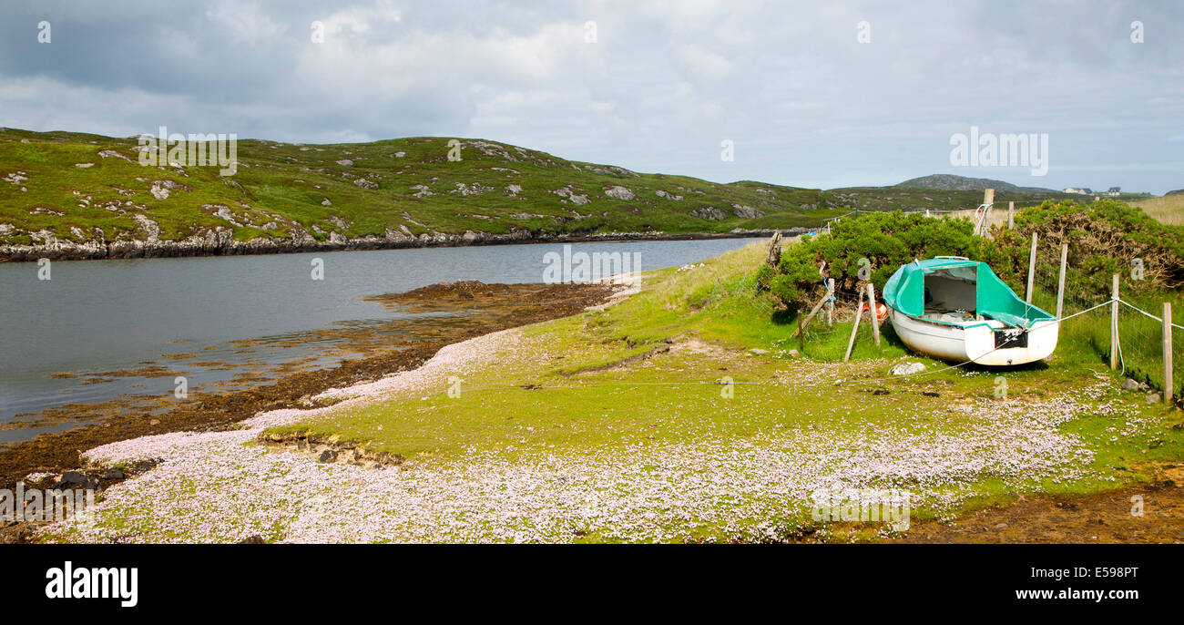 Small fishing boat on the east coast of Barra, Outer Hebrides, Scotland ...