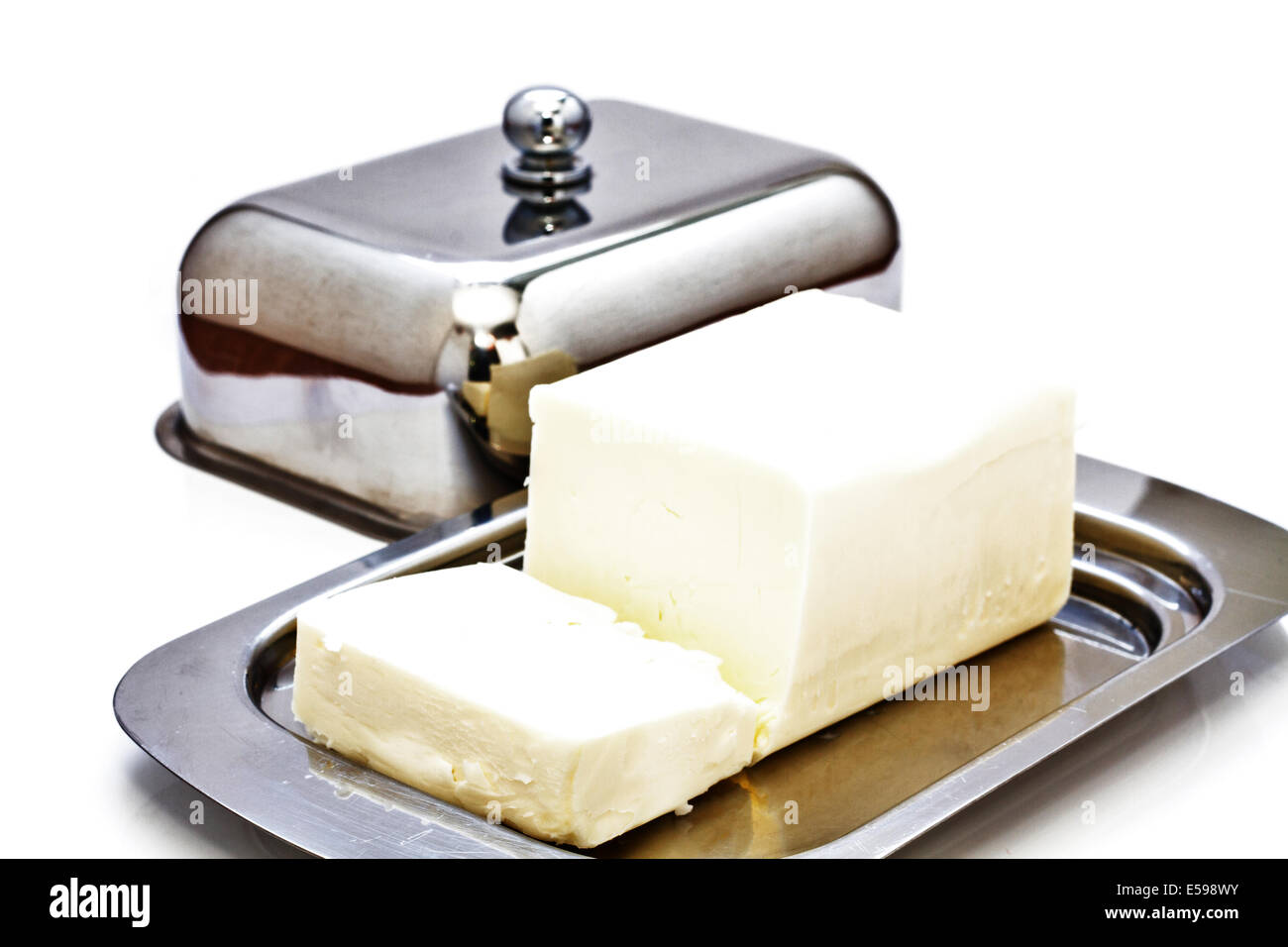 Butterdish stainless steel with butter isolated on white background ...