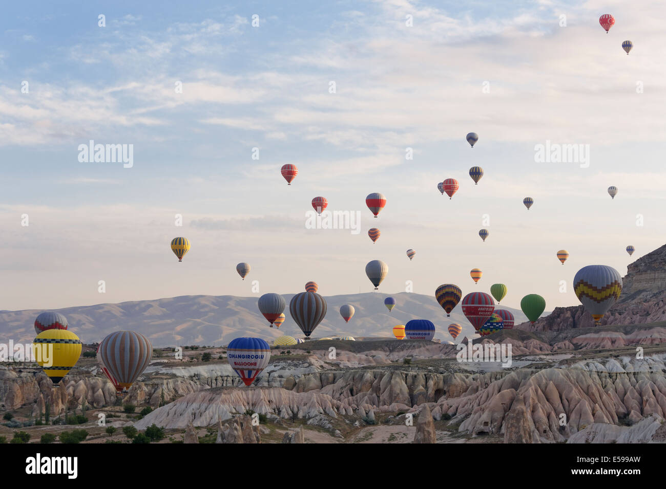 Turkey, Eastern Anatolia, Cappadocia, hot air balloons hoovering over ...