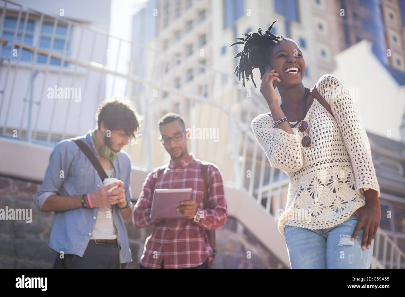 Friends chatting on street in hi-res stock photography and images - Alamy