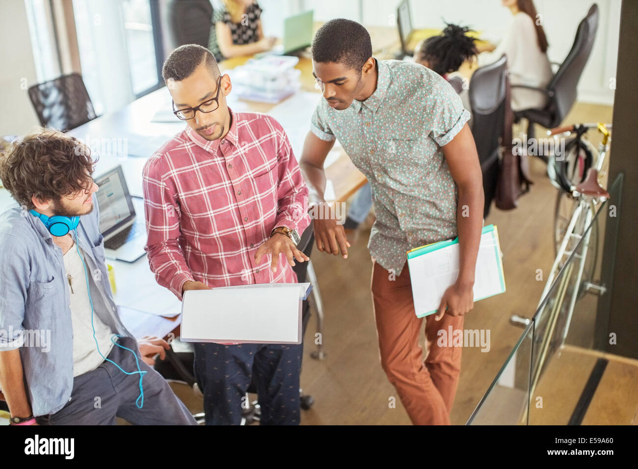 People working together in office Stock Photo - Alamy