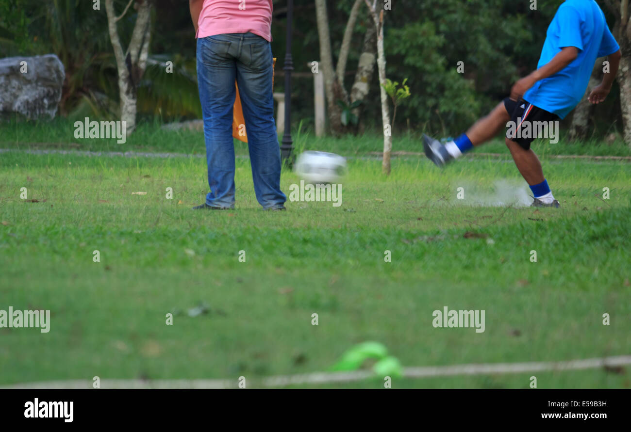 People playing football Stock Photo - Alamy