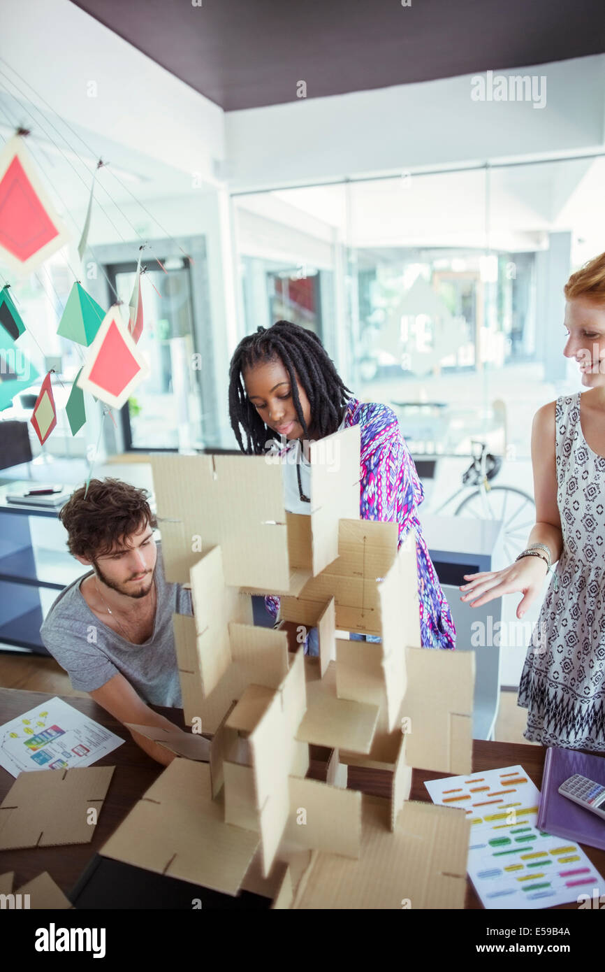 People building model in office Stock Photo - Alamy